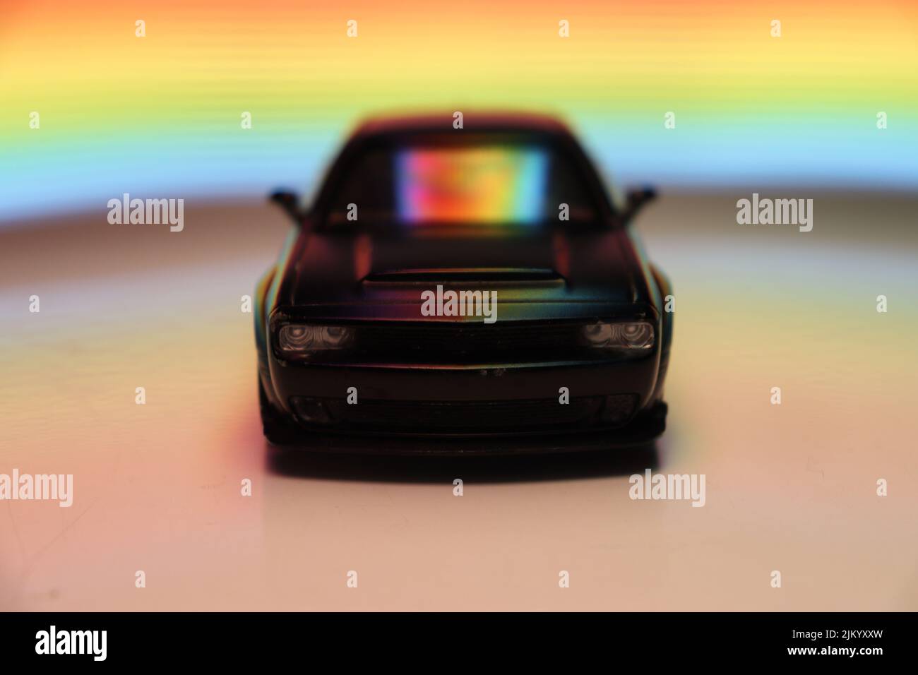 Beautiful rainbow floating over car Stock Photo - Alamy