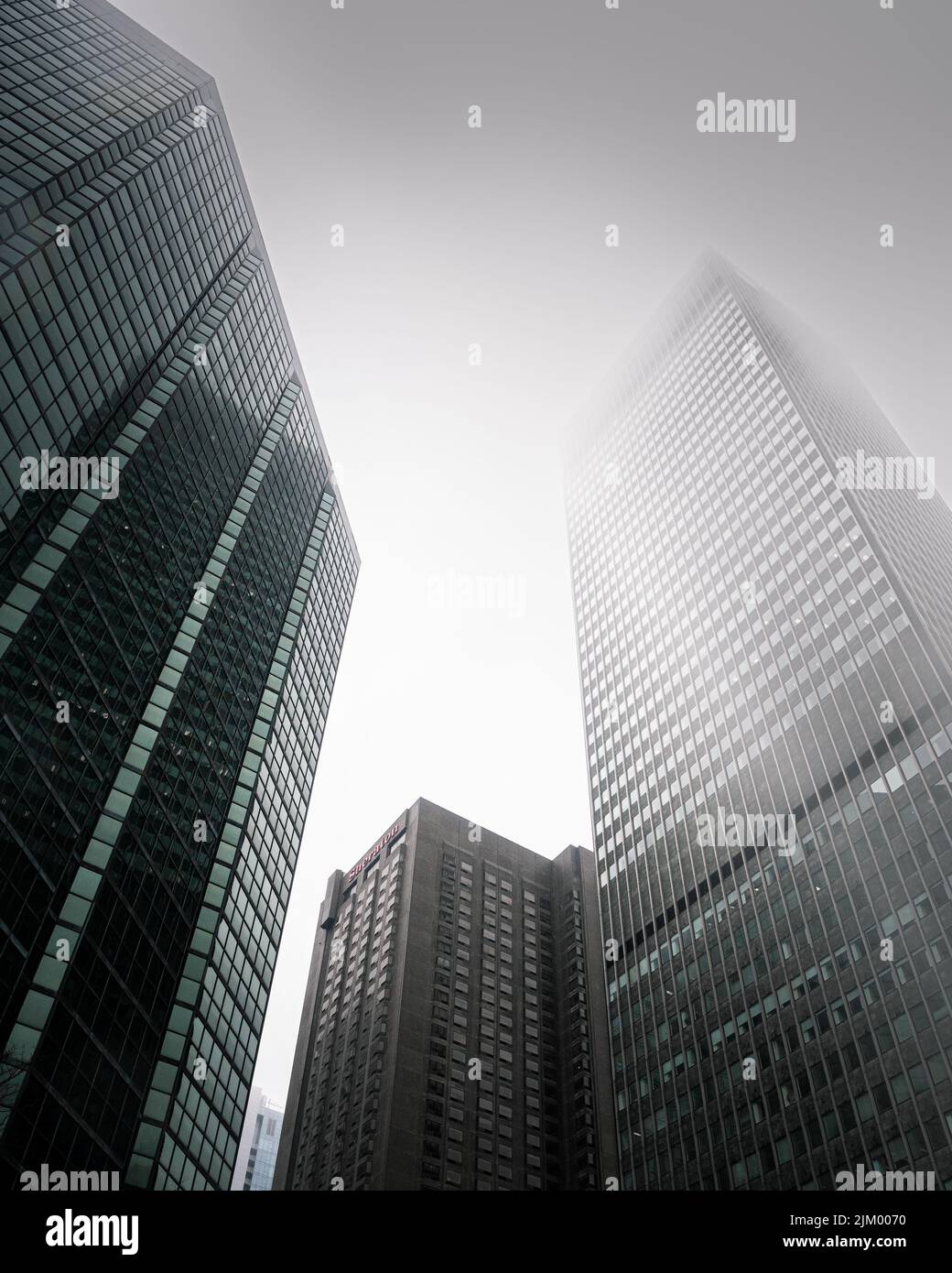 A vertical low angle shot of modern buildings in Montreal Stock Photo ...