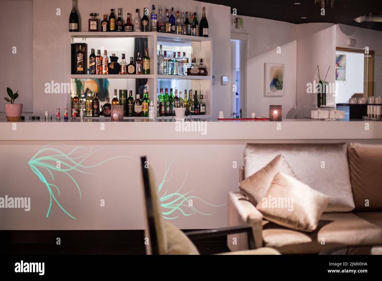 Different alcohol bottle on the shelf of a restaurant bar Stock Photo ...
