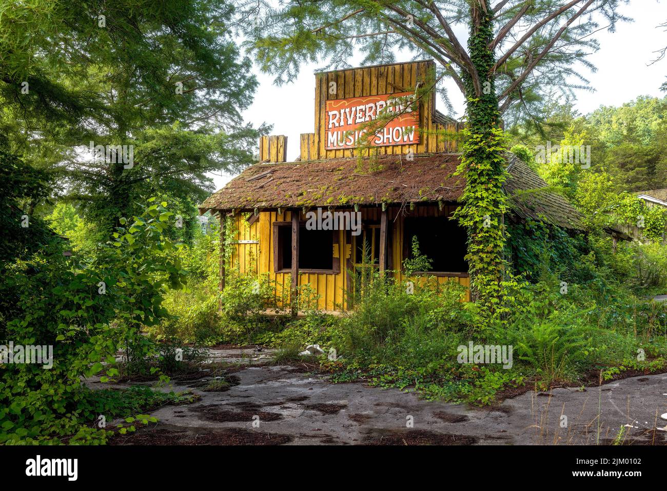 A wooden building with "Riverbend Music Show" sign at abandoned ...