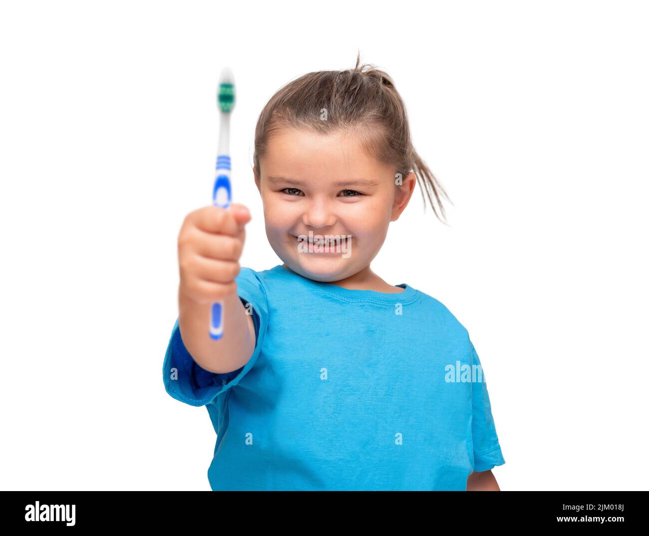 Portrait of a child with a toothbrush isolated on white background ...