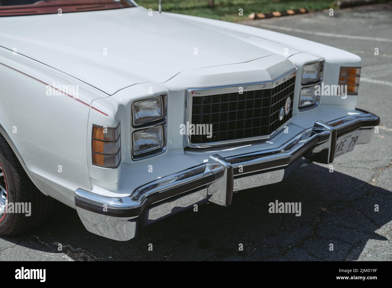 A closeup Shot from front side of a 1979 white Ford Ranchero classic ...