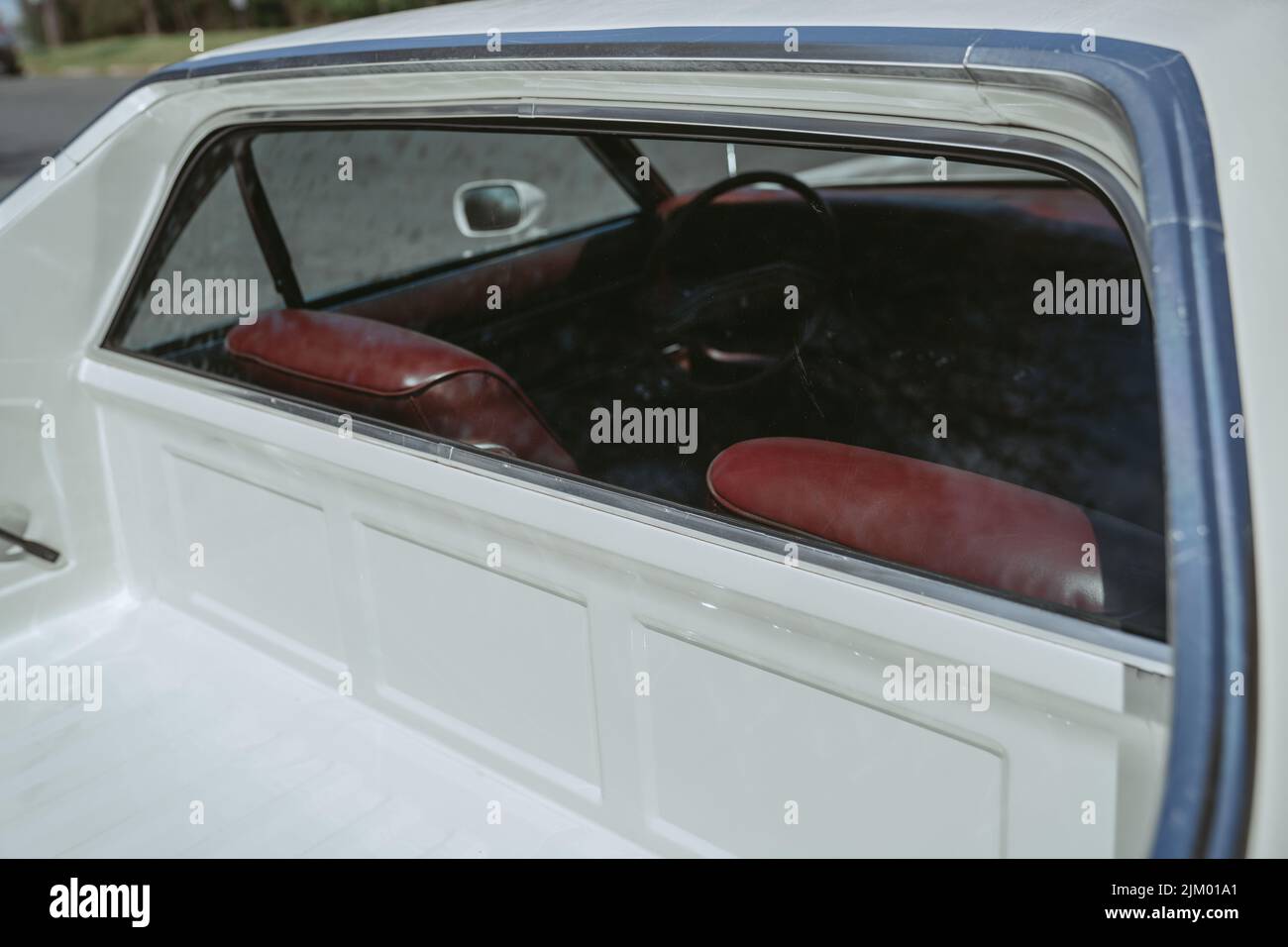 Closeup shot of the rear glass of a1979 Ford Ranchero white classic car ...