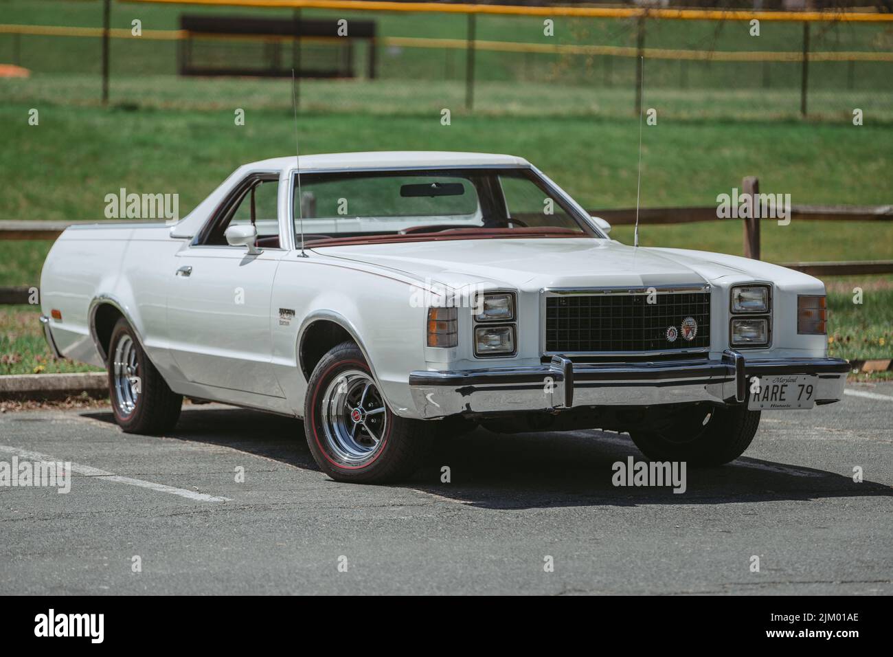 A beautiful Shot from front side view of a 1979 white Ford Ranchero ...