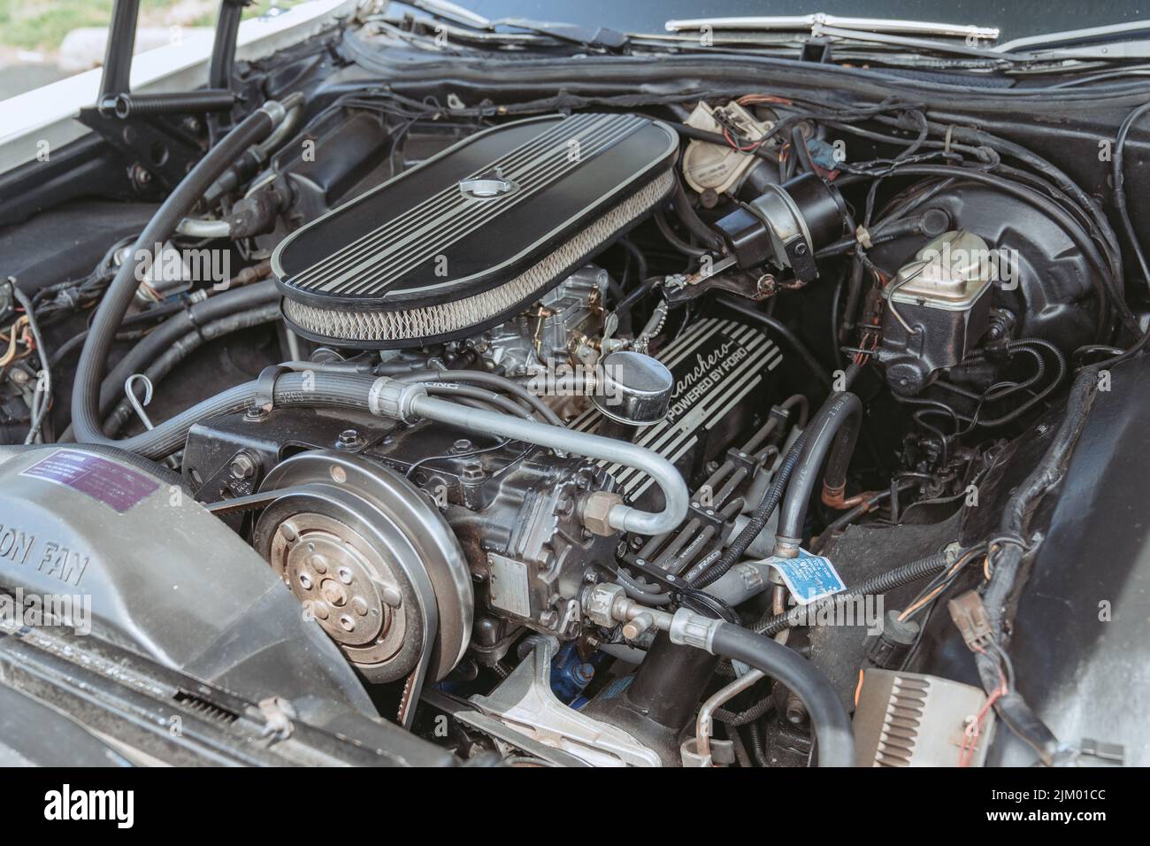 Closeup shot of the engine of a1979 Ford Ranchero white classic car ...