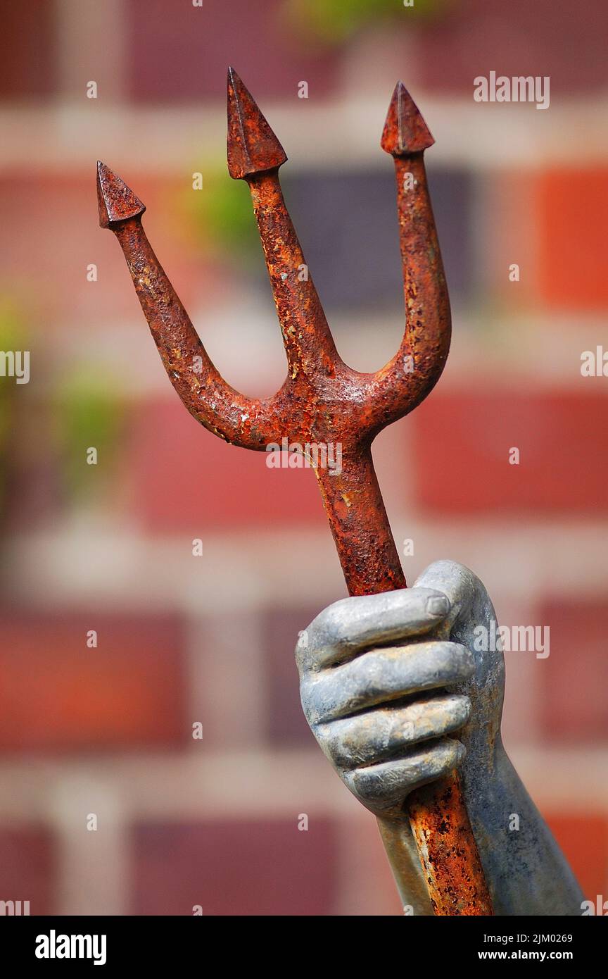 Trident in hand hi-res stock photography and images - Alamy