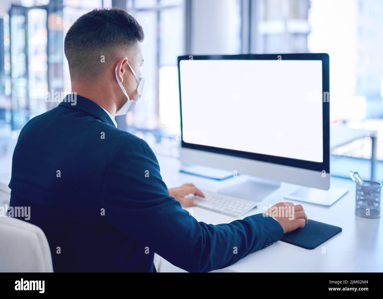 A pandemic wont stop his pursuit of success. a young businessman ...