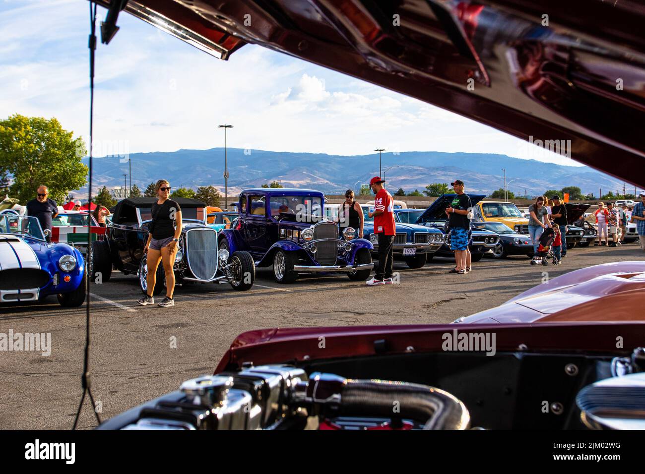 People enjoying the classic cars on display. Vehicles and car ...