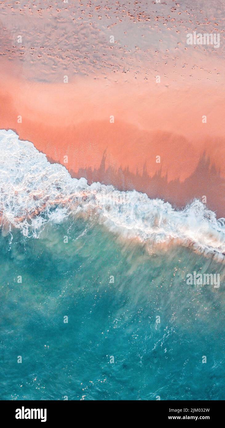 Aerial vertical ocean washing beach hi-res stock photography and images ...
