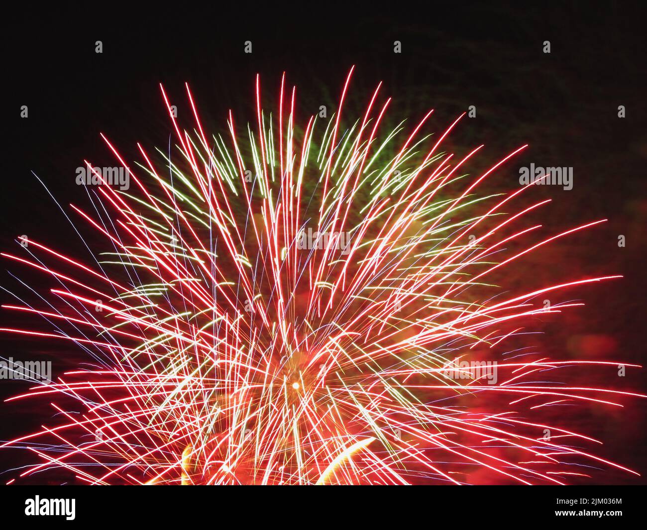 Colorful fireworks of various colors light up the night sky Stock Photo ...