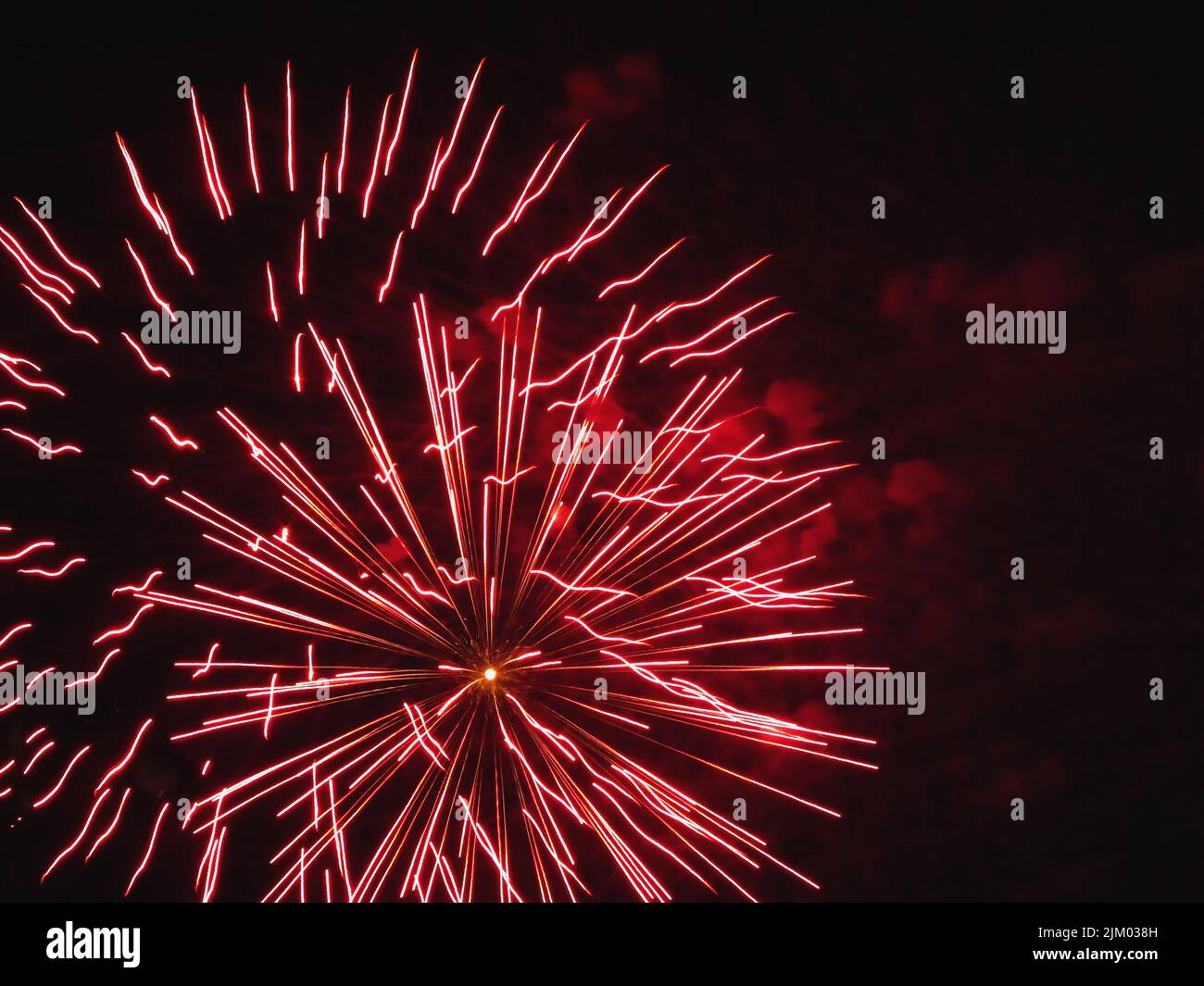 Colorful fireworks of various colors light up the night sky Stock Photo ...
