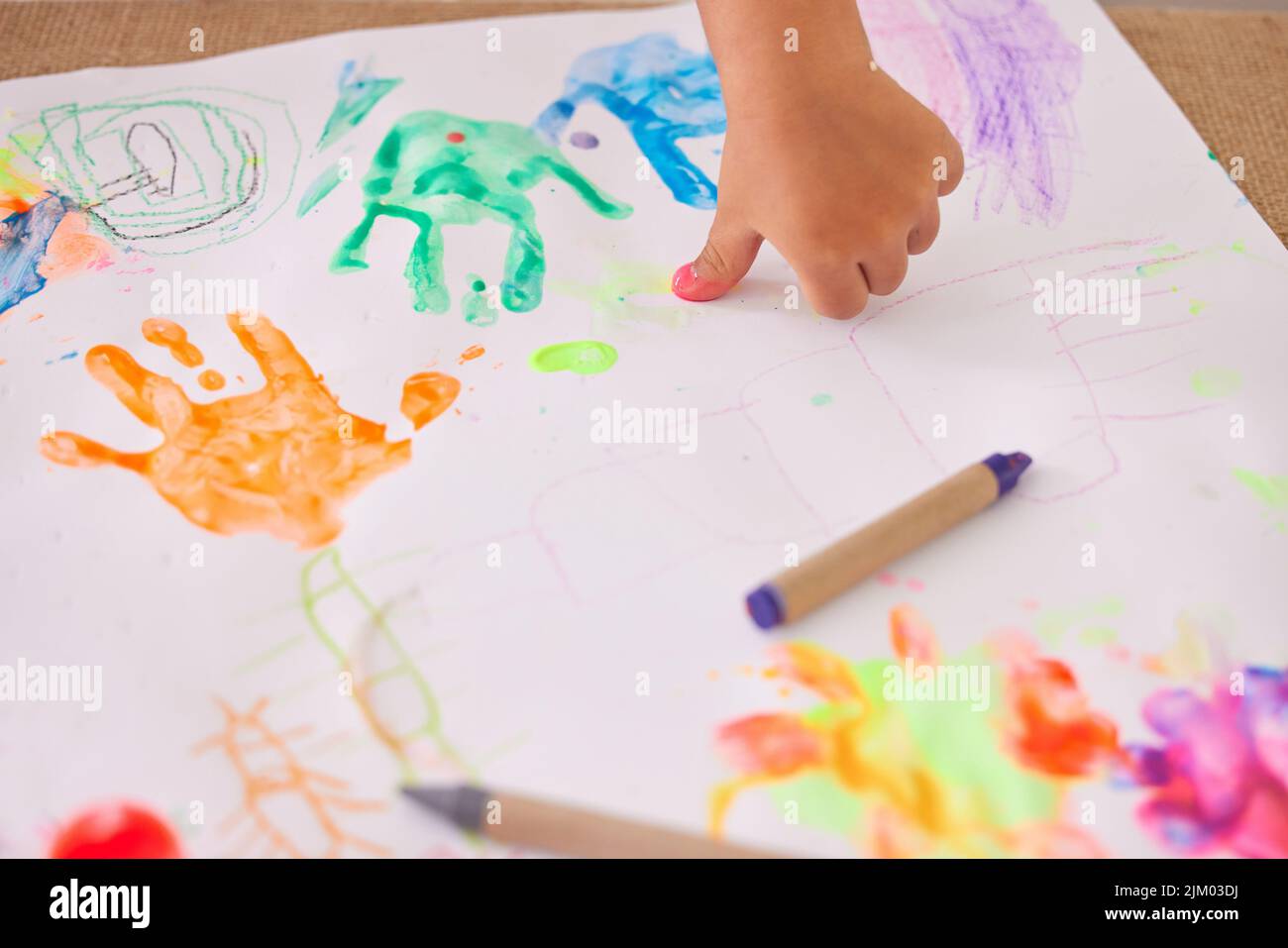 Painting provides lots of opportunities to learn. an unrecognizable ...