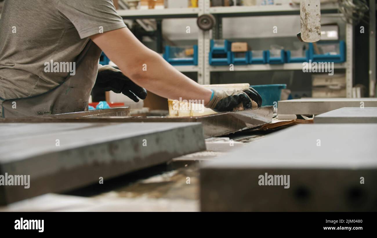 Concrete industry - washing the concrete slab with water from the ...