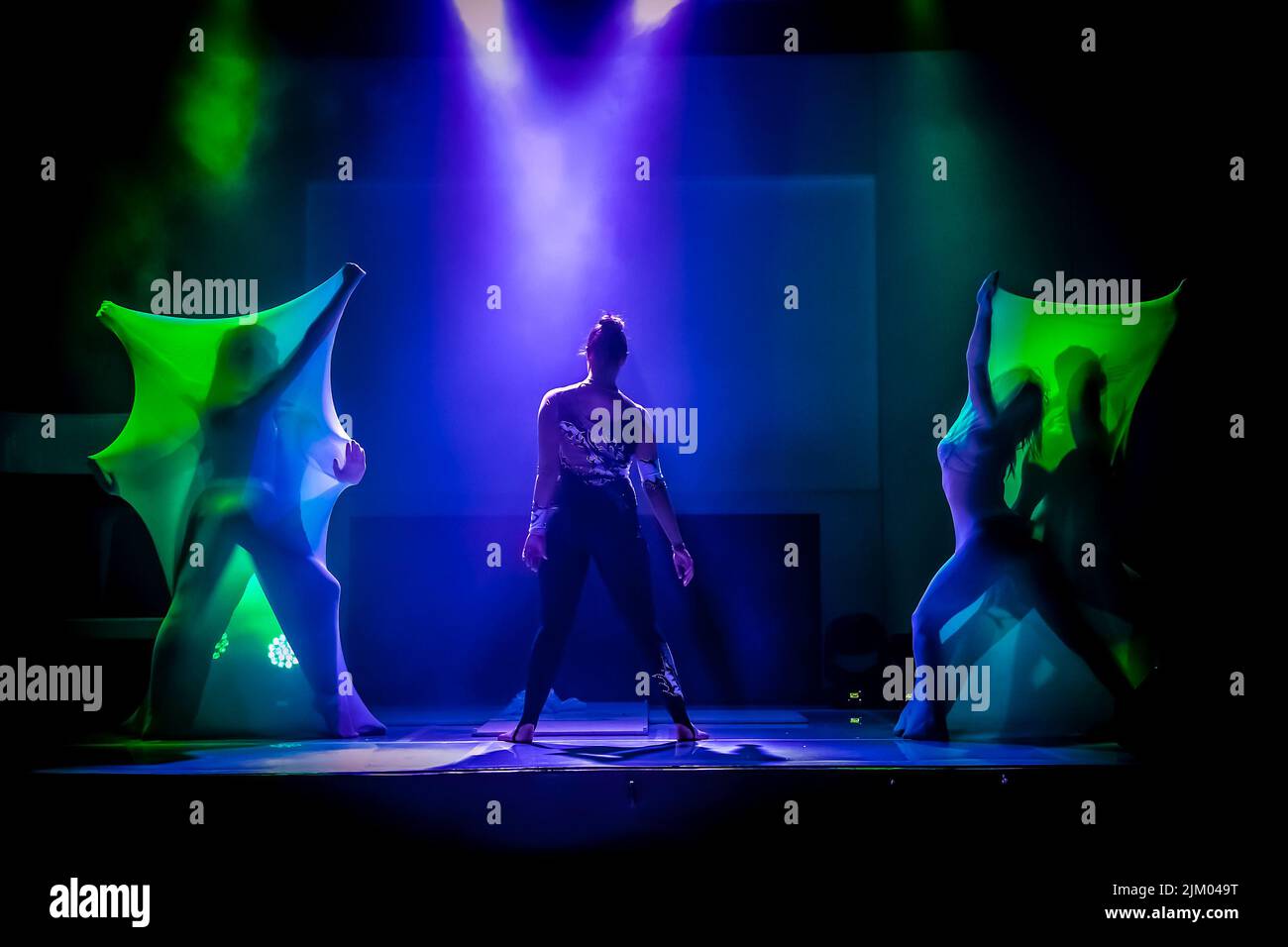 The contemporary dancers on stage at a party event Stock Photo - Alamy