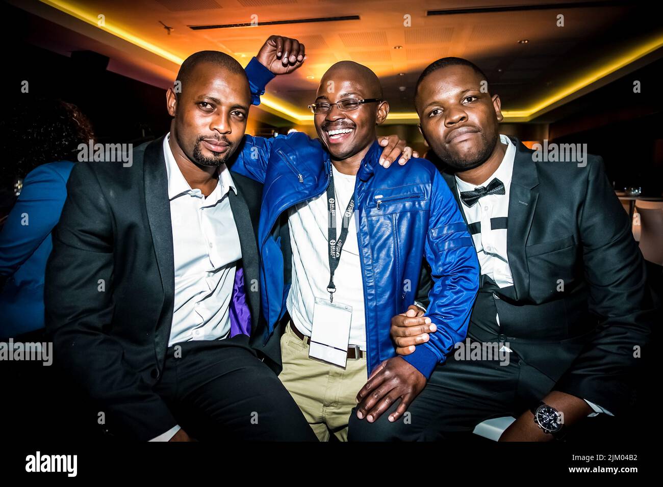 A group of black men at a cocktail party in Johannesburg, South Africa ...