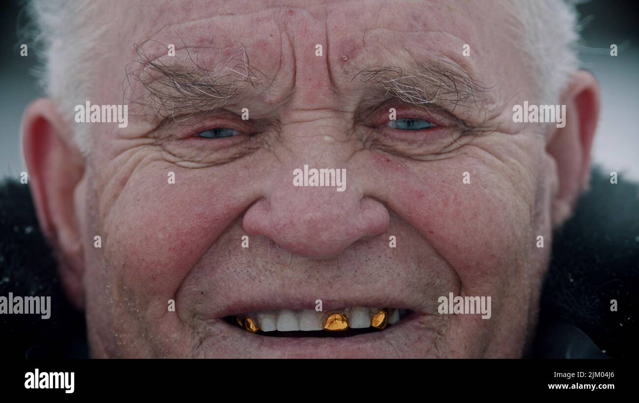 Elderly grandfather - old smiling grandfather looking in the camera ...