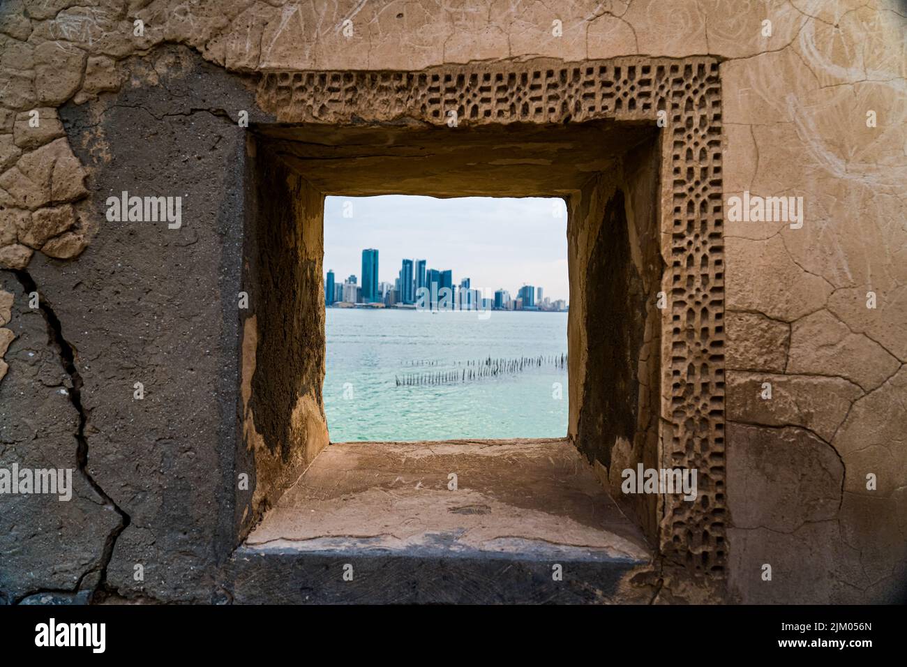 A view of the modern cityscape with skyscrapers from an old Bu Maher ...