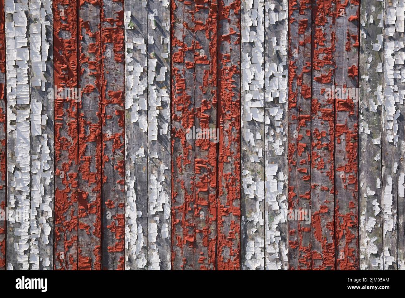 Close-up of peeling red and white paint on wood plank siding Stock ...