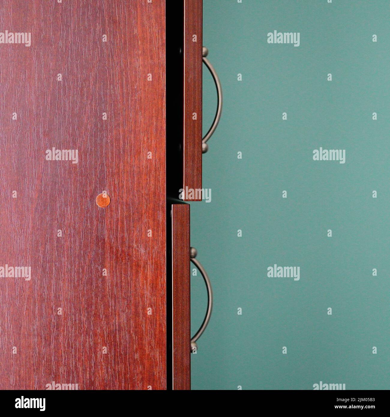 A closeup of a wooden closet Stock Photo - Alamy