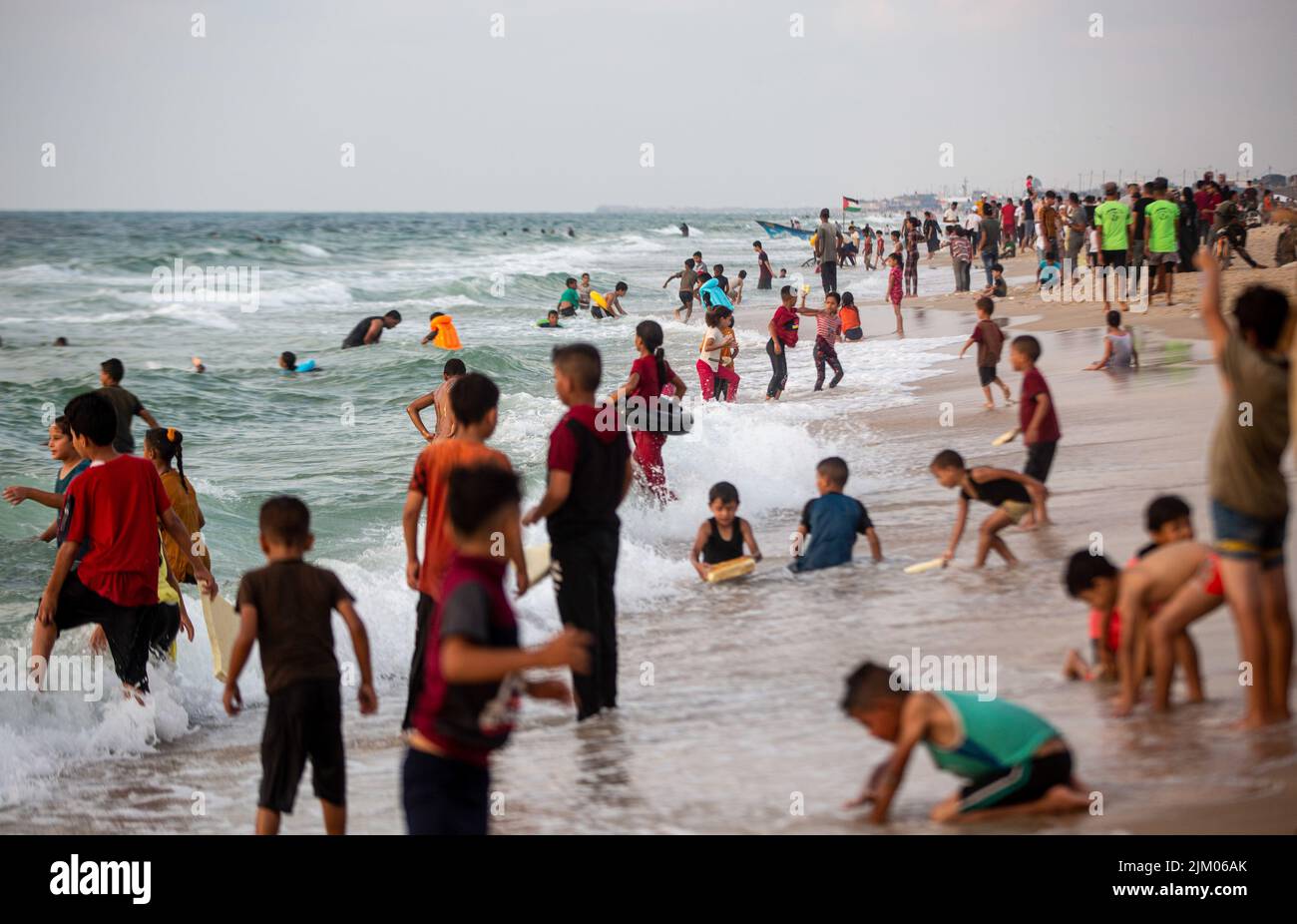 Gaza, Palestine. 03rd Aug, 2022. Palestinians seen bathing at the ...