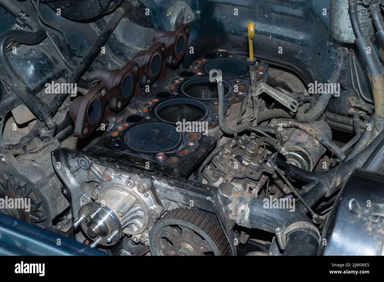 A closeup shot of a car engine with rust at a mechanic's station Stock ...