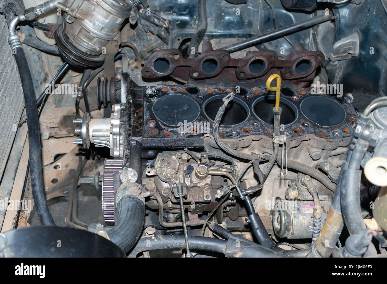 A closeup shot of a car engine with rust at a mechanic's station Stock ...