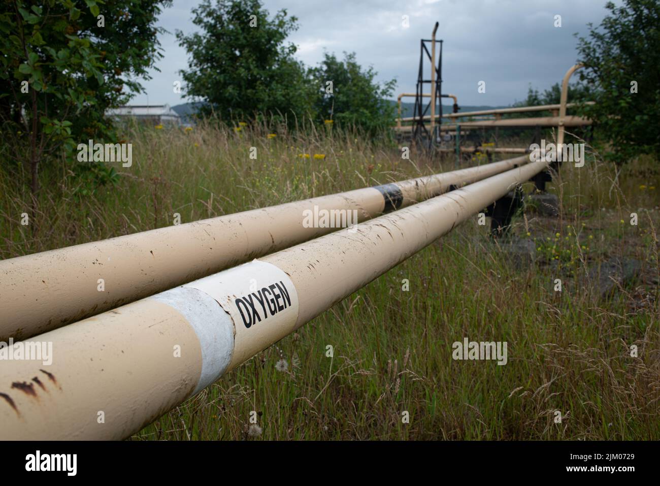 A side shot of old oxygen pipes on derelict site of former steelworks ...