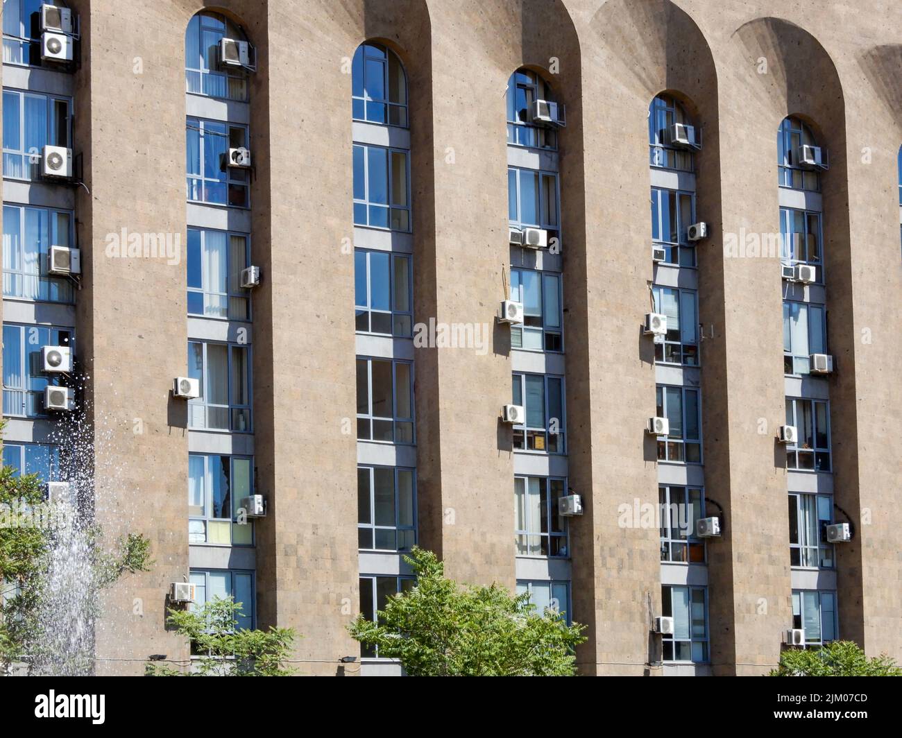 The exterior of the Soviet architecture with arched geometric shaped ...