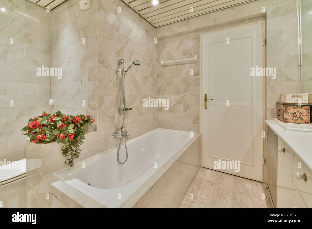 Modern home interior design of white bathroom with open bathtub and ...