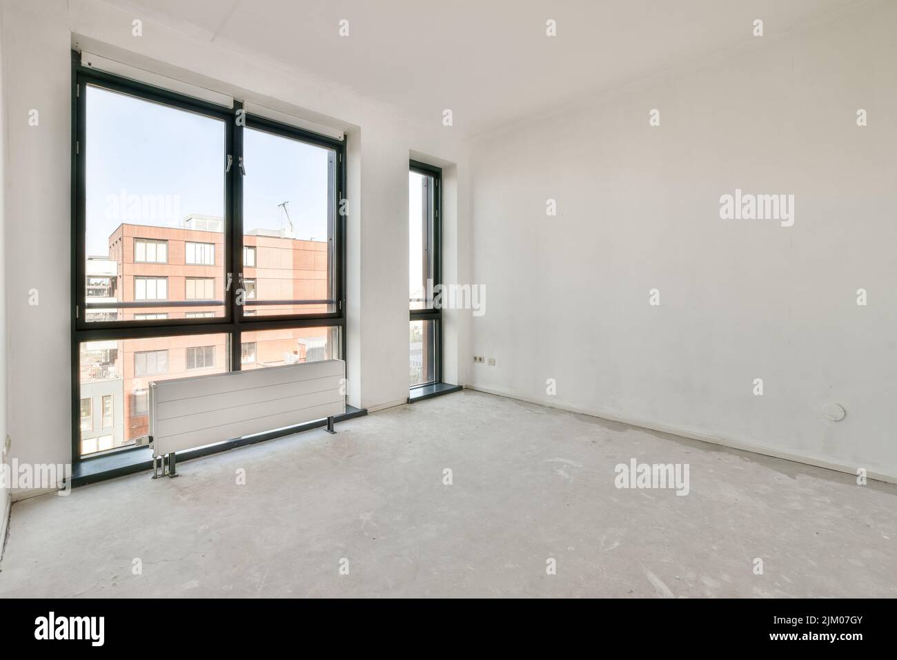 A cozy and spacious empty room in a luxury house Stock Photo - Alamy