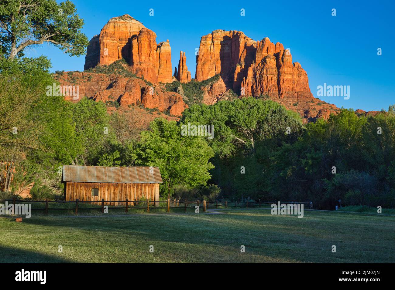 The historic Cathedral Rock and an old barn in Sedona, Arizona Stock ...