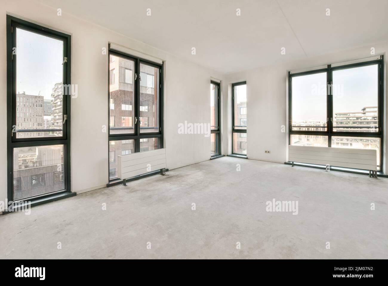 A cozy and spacious empty room in a luxury house Stock Photo - Alamy