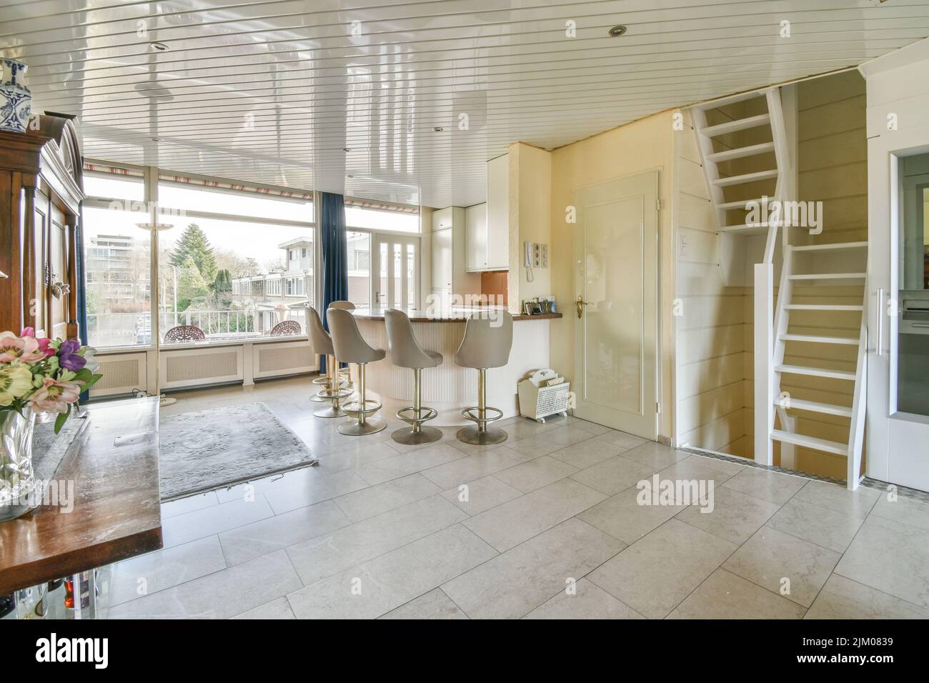 Spacious modern room with lounge and dining areas 49 8 Couches and ...