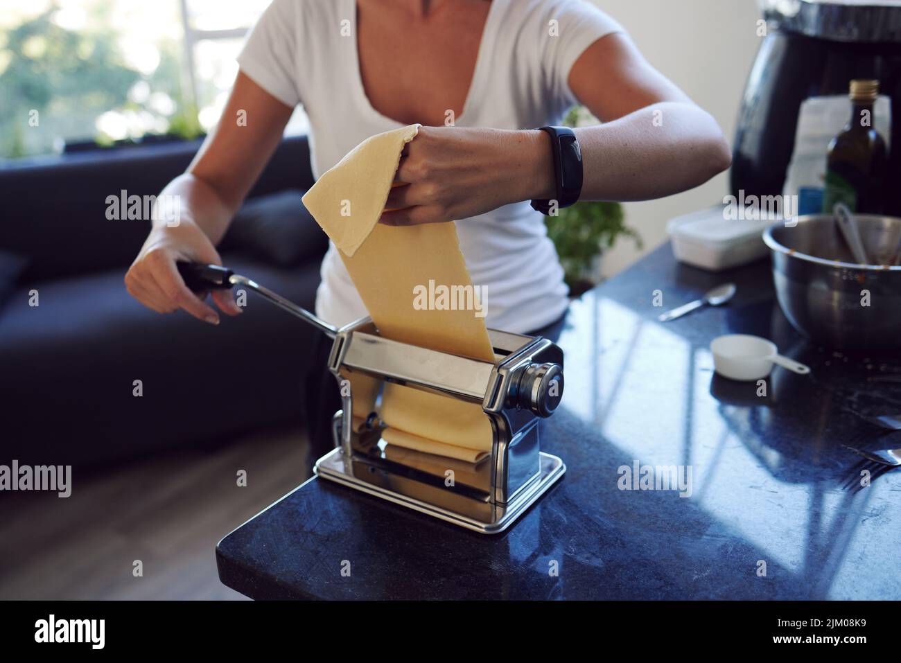 Homemade is always best. an unrecognizable young woman cooking homemade ...