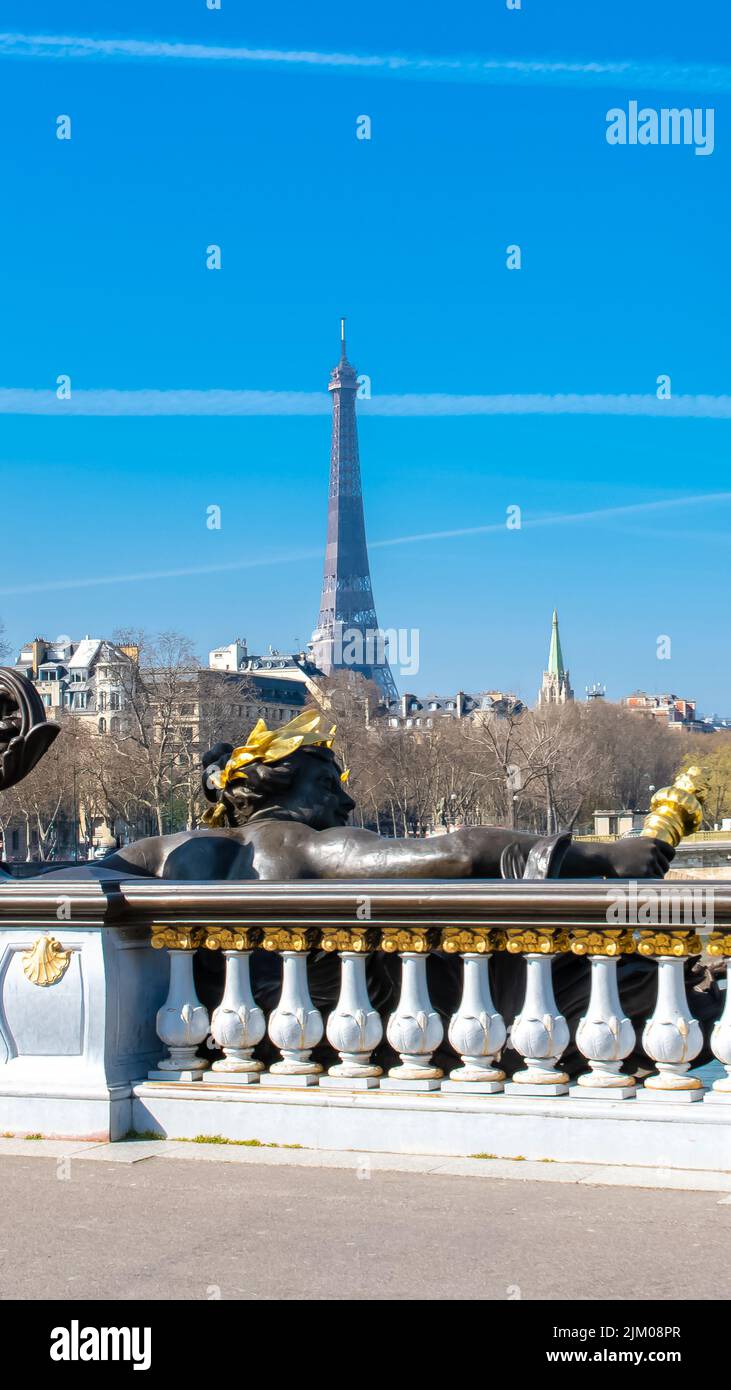 Paris, the Alexandre III bridge on the Seine, with the Eiffel Tower in ...