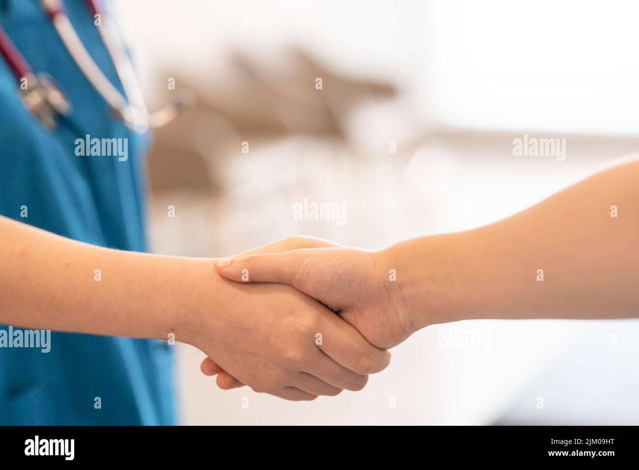 Doctor business man shake hands hi-res stock photography and images - Alamy