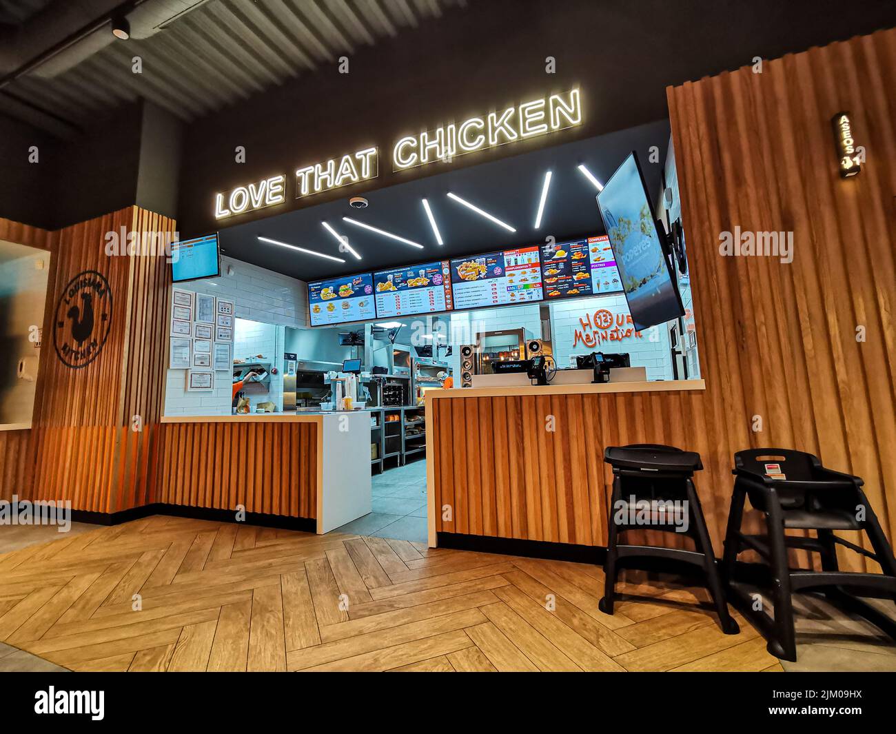 An interior of a kitchen of a fast food restaurant of the Popeyes chain ...