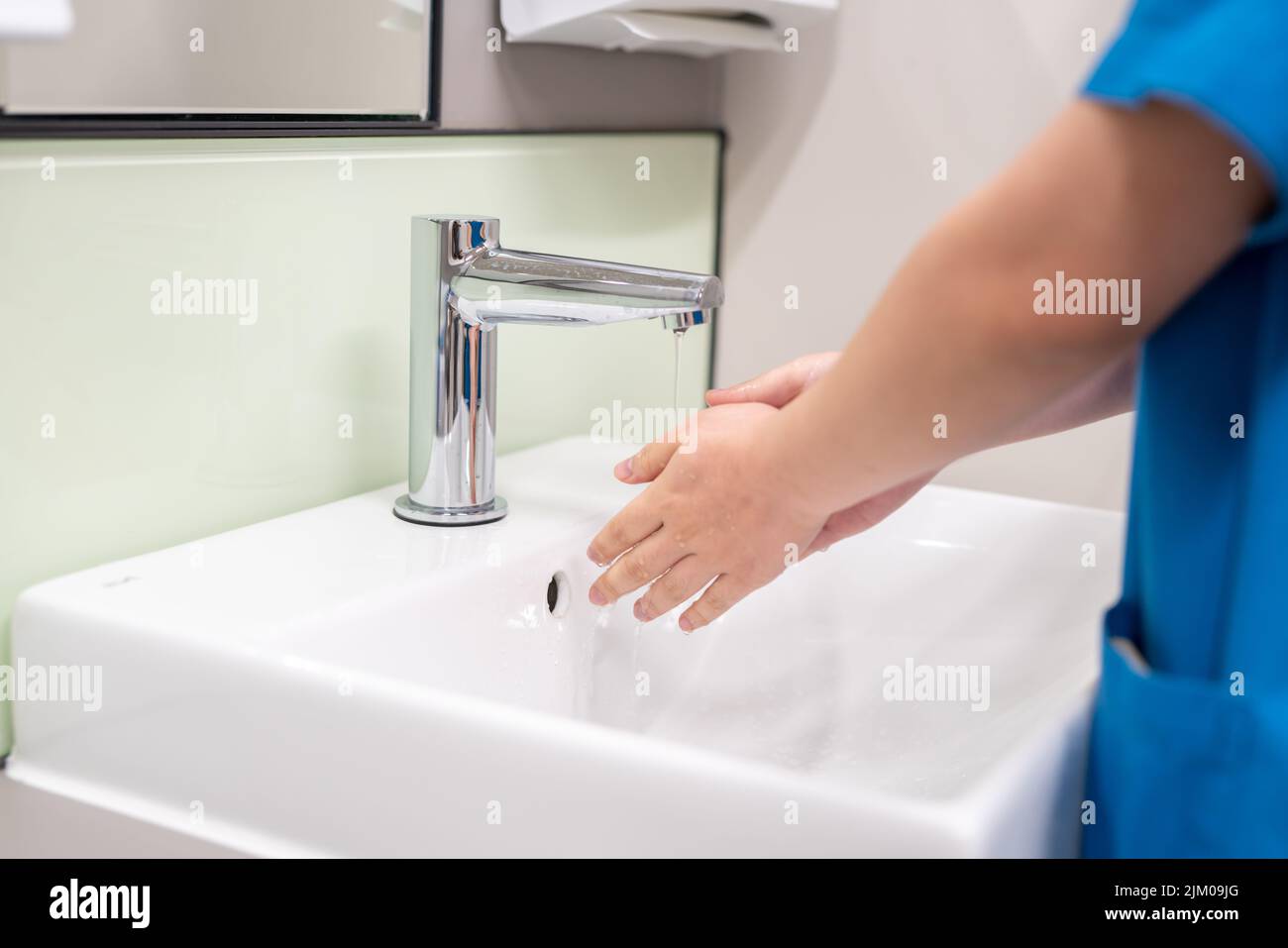 doctor washing hand before examine patient body Stock Photo - Alamy