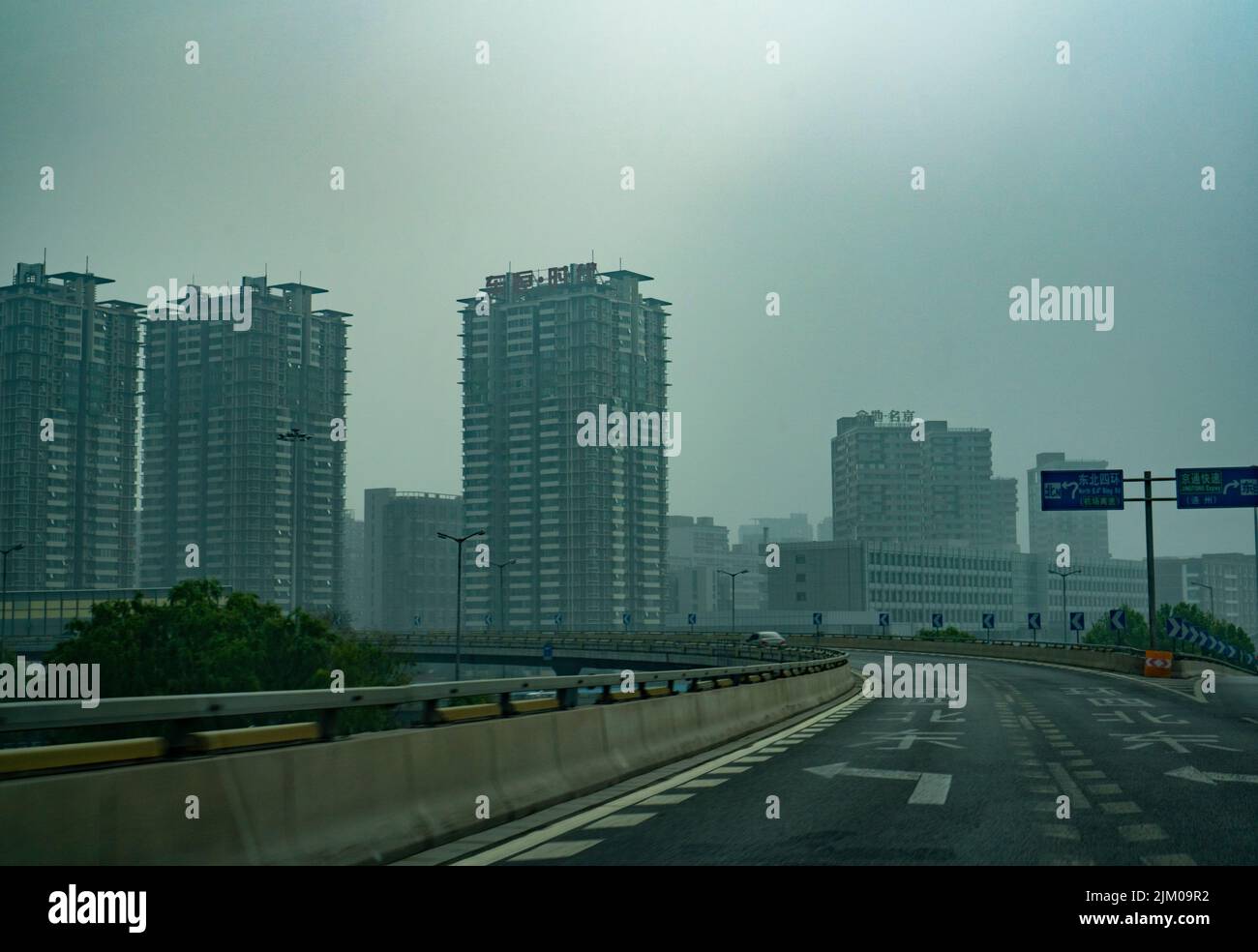 A misty sky over buildings in Beijing, China Stock Photo - Alamy