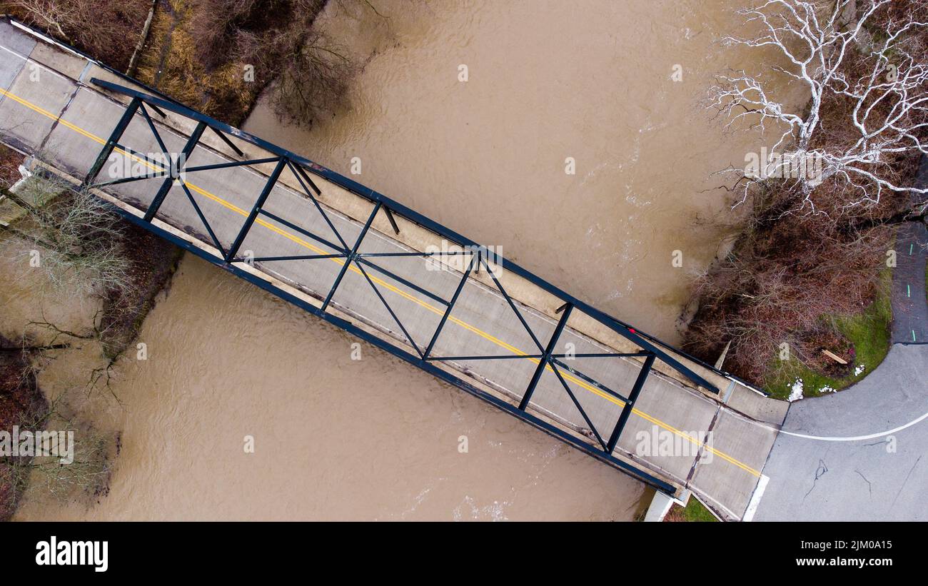 An aerial view of a bridge on the river at daytime Stock Photo - Alamy