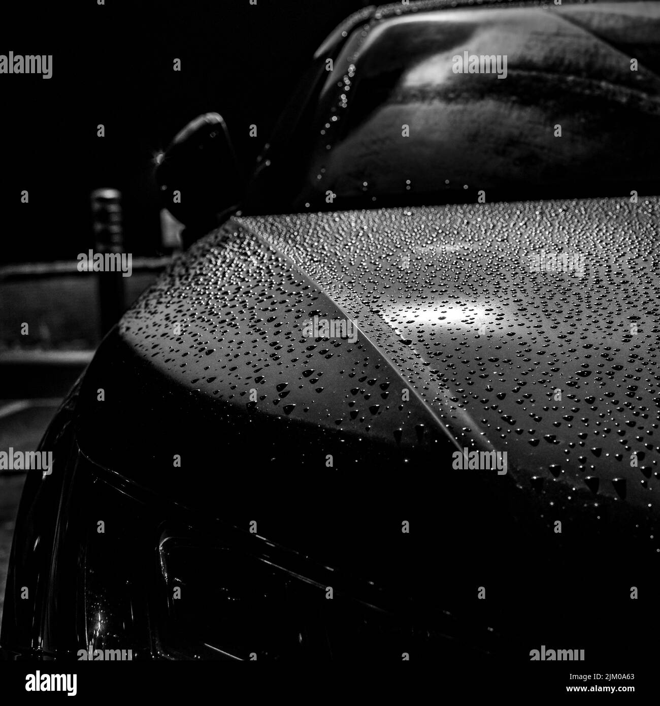 A grayscale shot of the car Stock Photo - Alamy