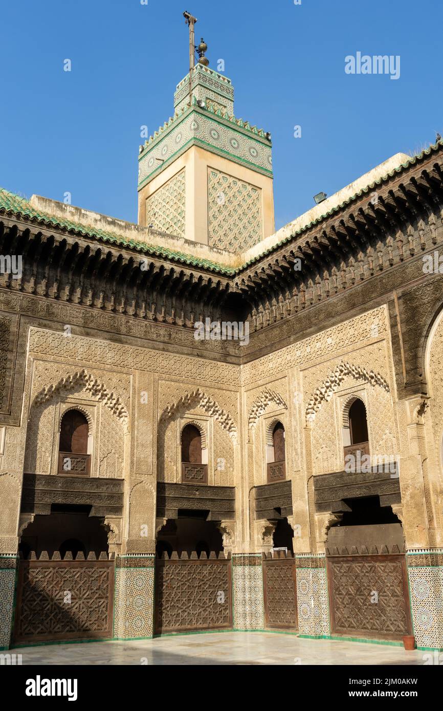 The minaret of Madrasa Bou Inania in the old medina of Fes Stock Photo ...