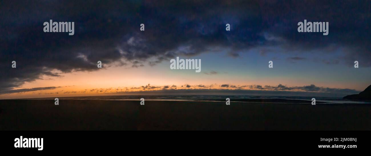 A panoramic scene landscape view of gray sunset dark sky on majestic ...