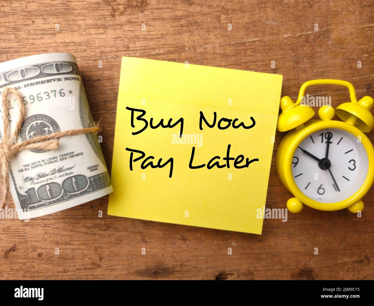 Banknotes,clock and sticky note with the word Buy Now Pay Later Stock ...