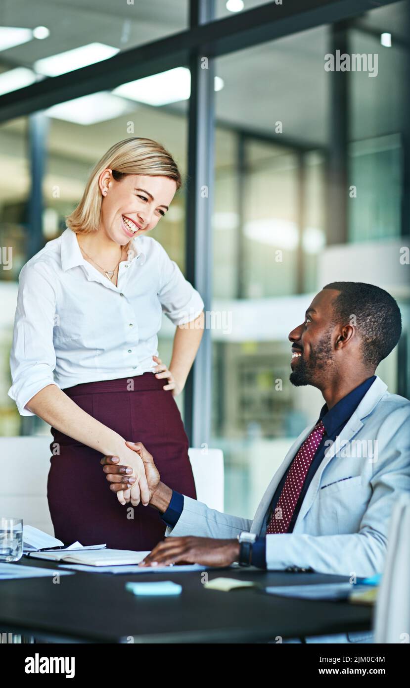Handshake, greeting and agreement by businesspeople in the office ...