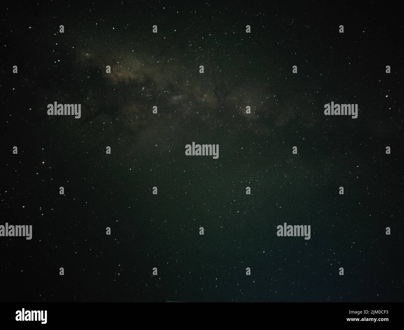 A scenic view of stars illuminating the dark night sky Stock Photo - Alamy