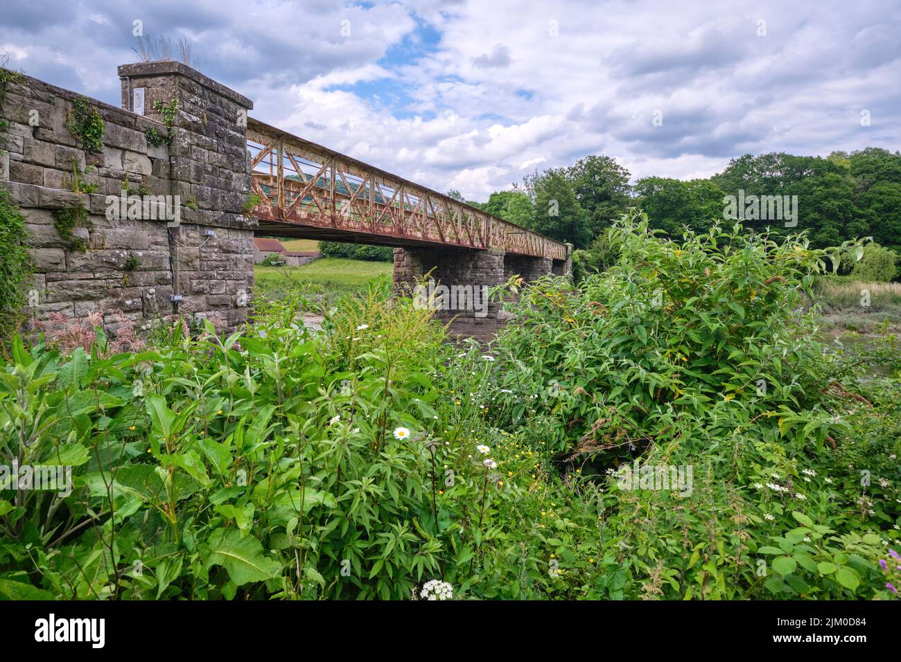 An old steel, rusty, rail, train trestle bridge, now used as a nature ...