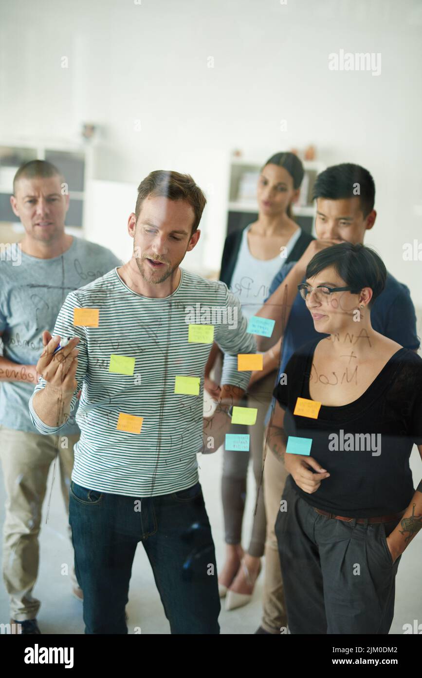 Guy talking colleagues during presentation hi-res stock photography and ...
