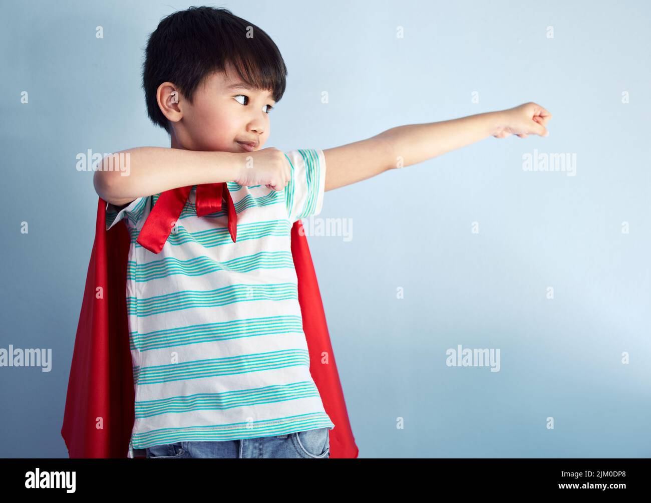 Hes a brave little boy. an adorable little boy pretending to be a ...