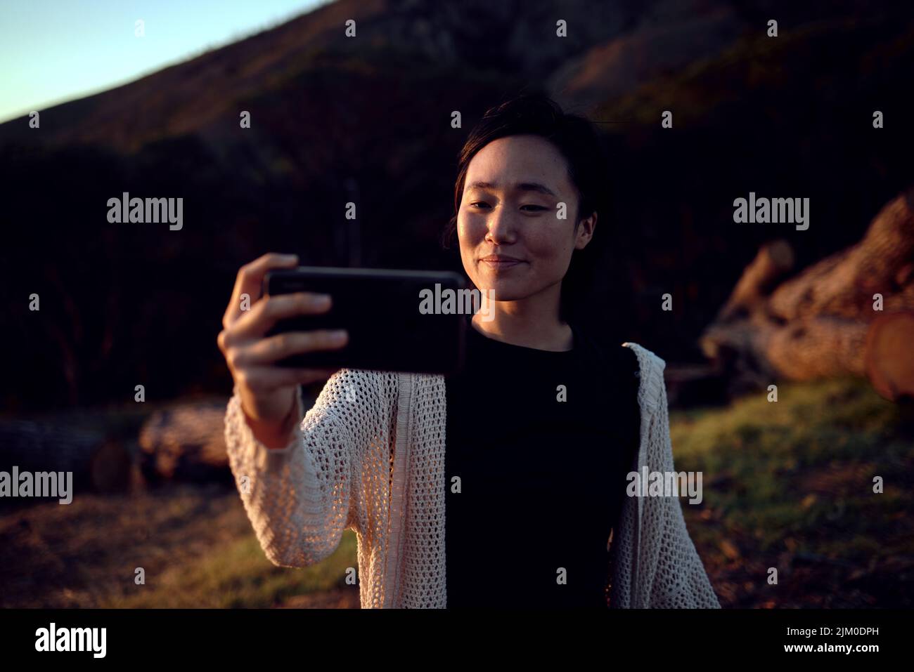 Nature makes it so easy for to just be your-selfie. a woman taking ...